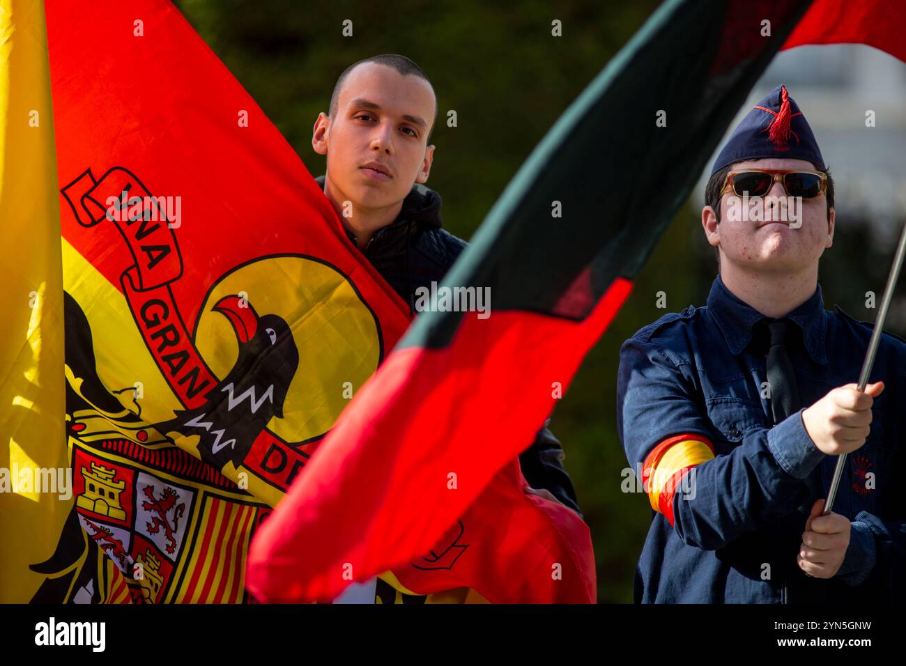 Supporters hold Francoist flags during a rally commemorating the ...