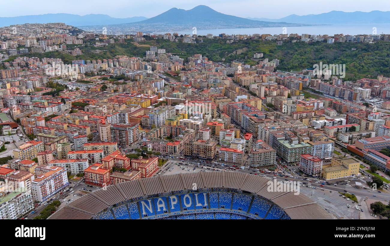 Stunning aerial view of Napoli cityscape with iconic Mount Vesuvius in ...