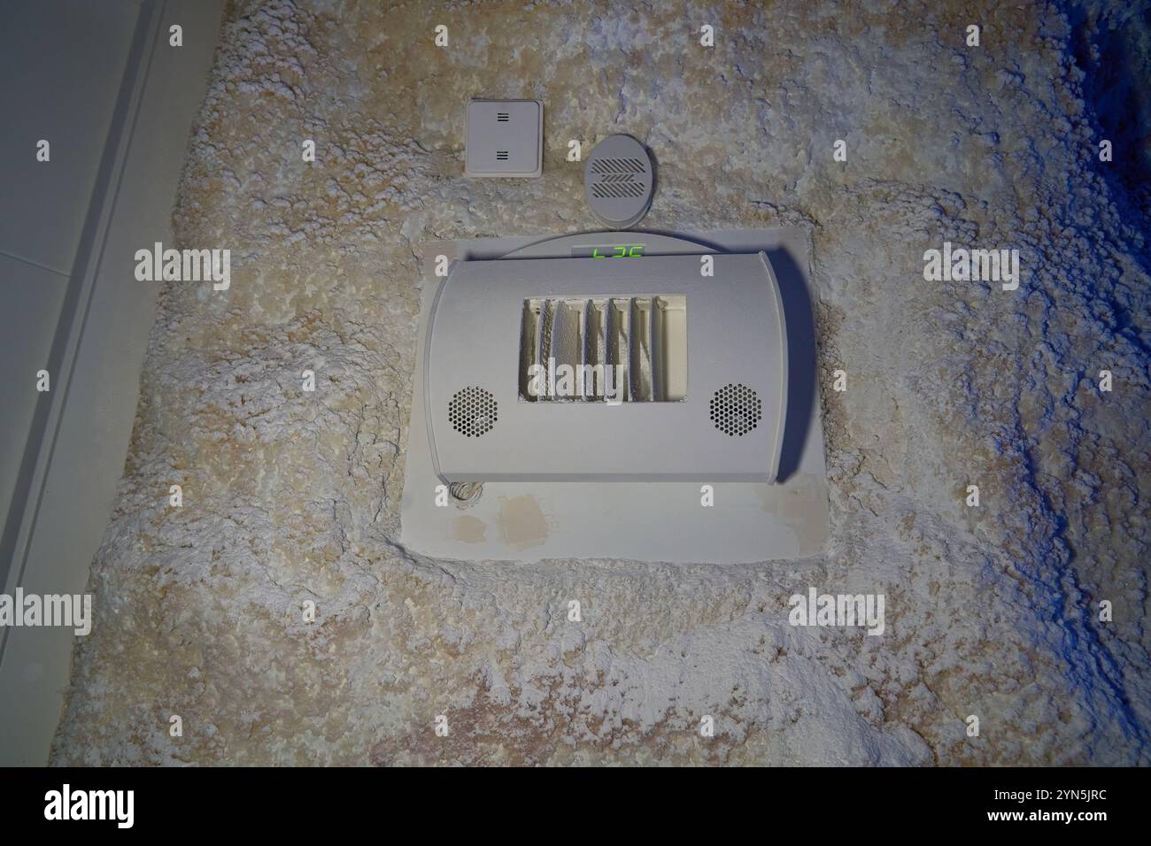 Ventilation system on a salt-covered wall in a halotherapy room Stock ...