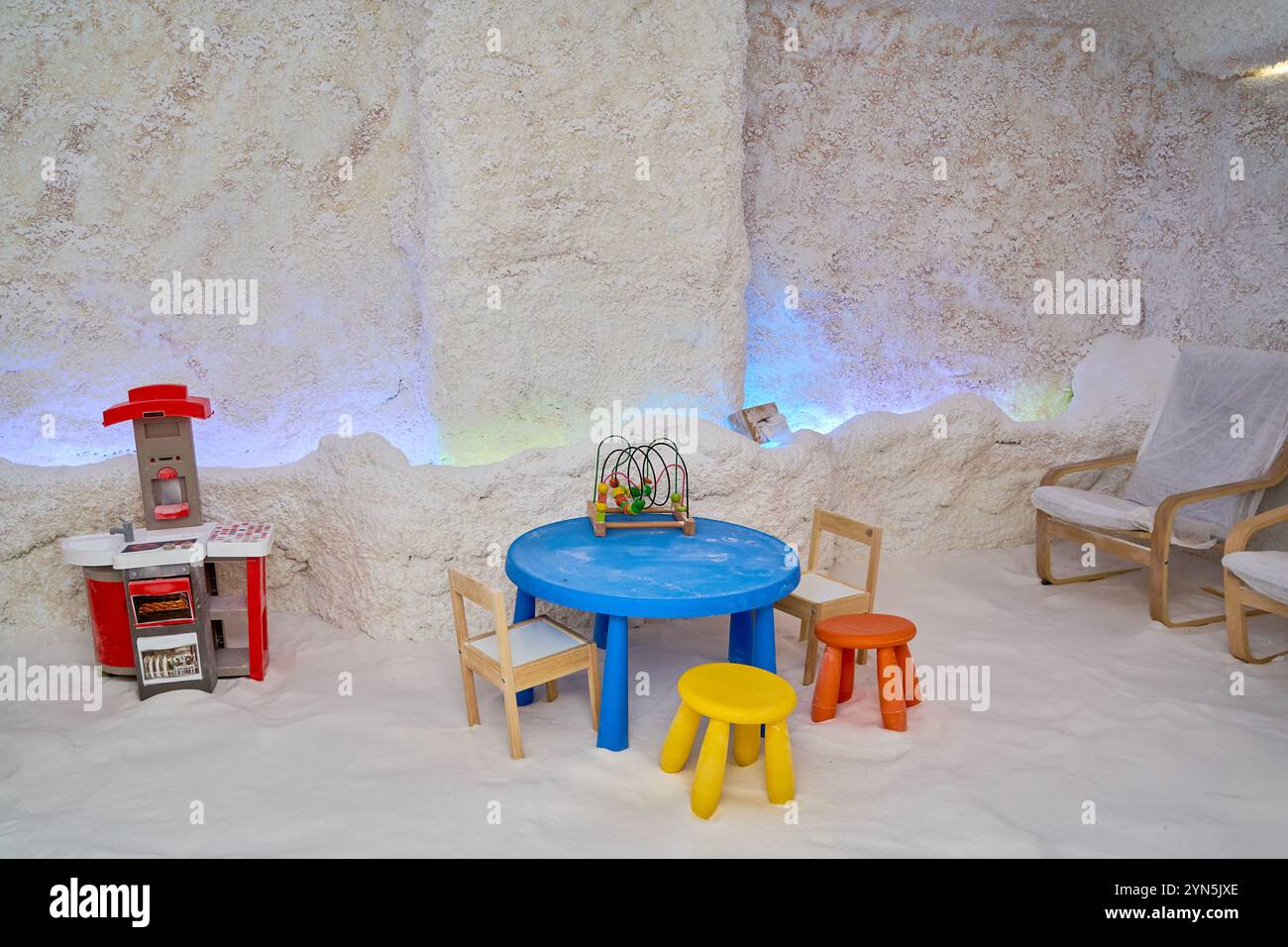 Children's play area in a salt cave for halotherapy sessions Stock ...
