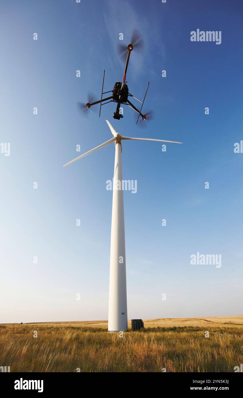 Flying drone inspecting wind turbine hi-res stock photography and ...