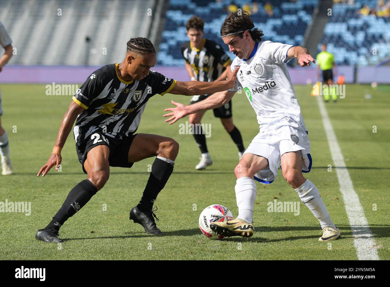 Kealey Otieno Adamson (L) of Macarthur FC and William Bruce Gillion (R ...
