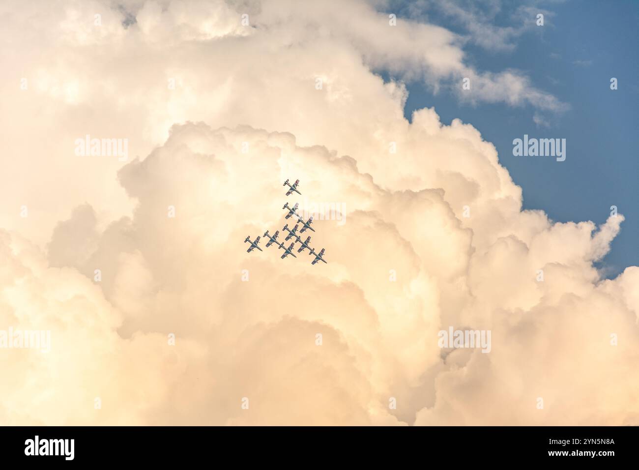 Fighter jets flying in a triangle formation during airshow in scenic ...
