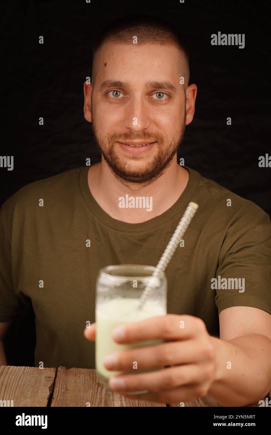 Young man drinking vitamin tea hi-res stock photography and images - Alamy