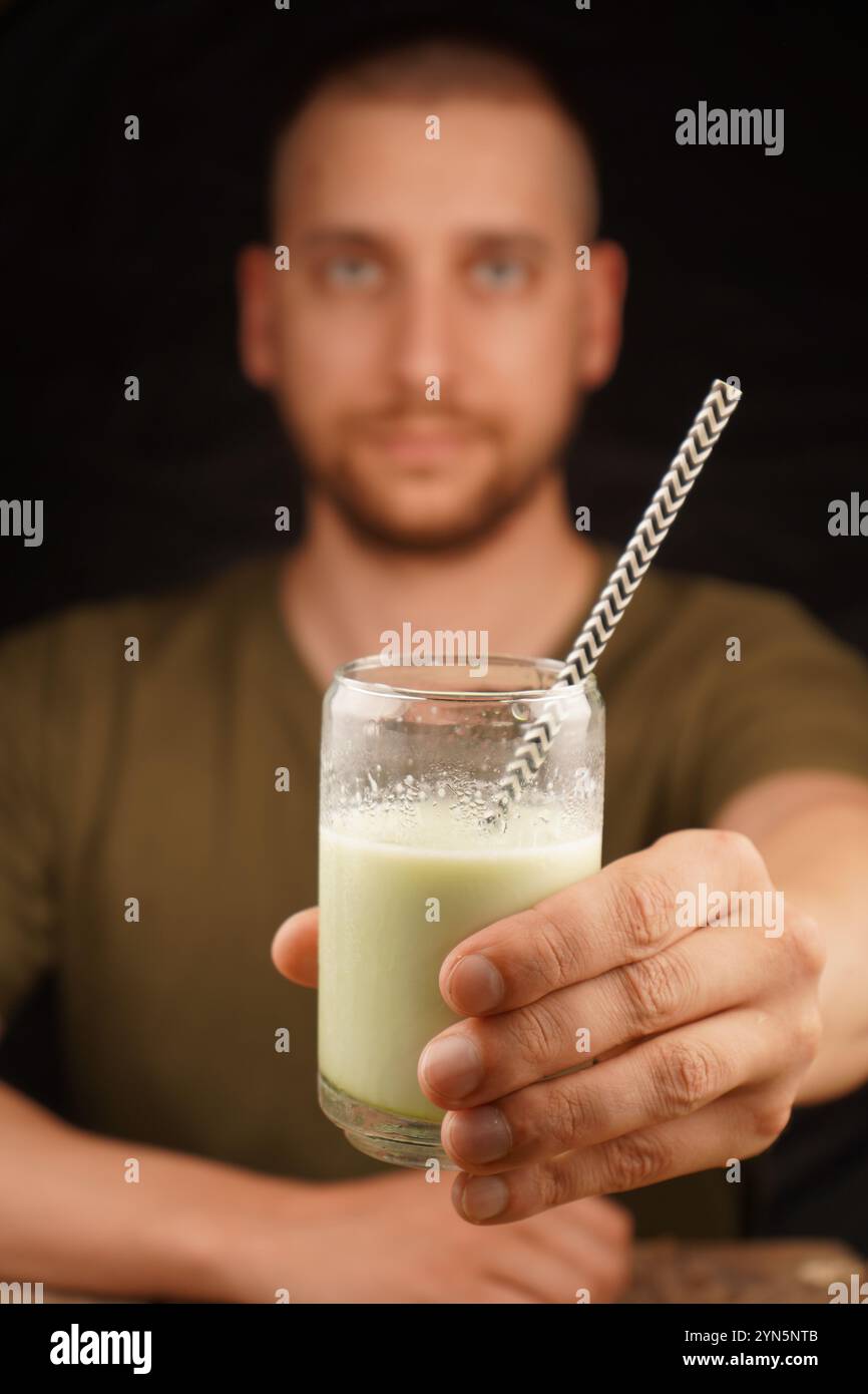 Young man drinking vitamin tea hi-res stock photography and images - Alamy