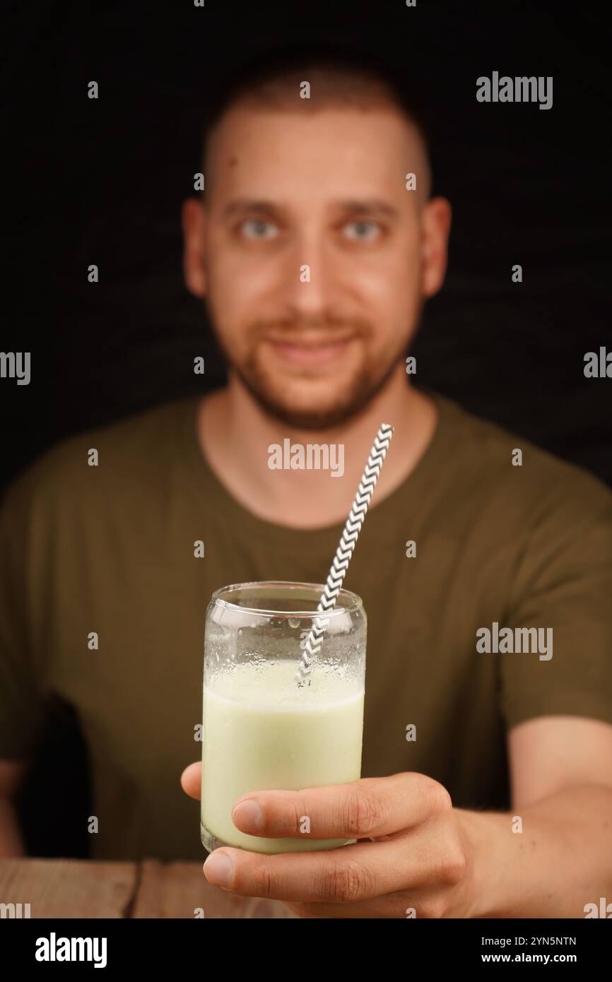Young man drinking vitamin tea hi-res stock photography and images - Alamy