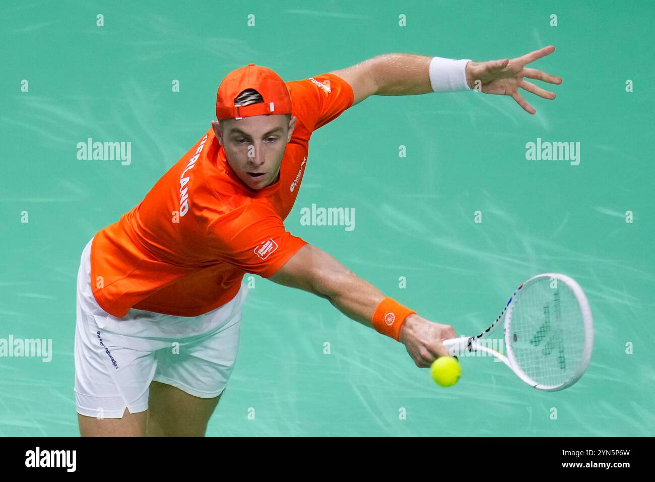 Netherlands' Tallon Griekspoor backhands to Italy's Jannik Sinner ...