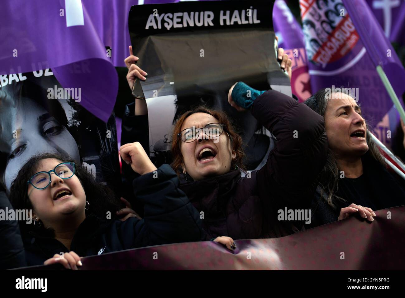 Women chant slogans during a rally marking the upcoming International ...