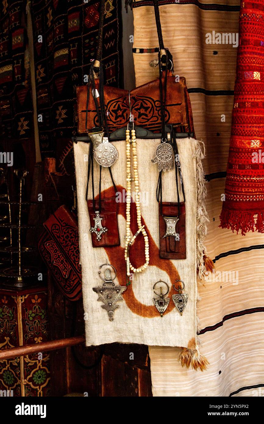 Textiles, handbags and jewelry in the gift store. Traditional Arab and ...