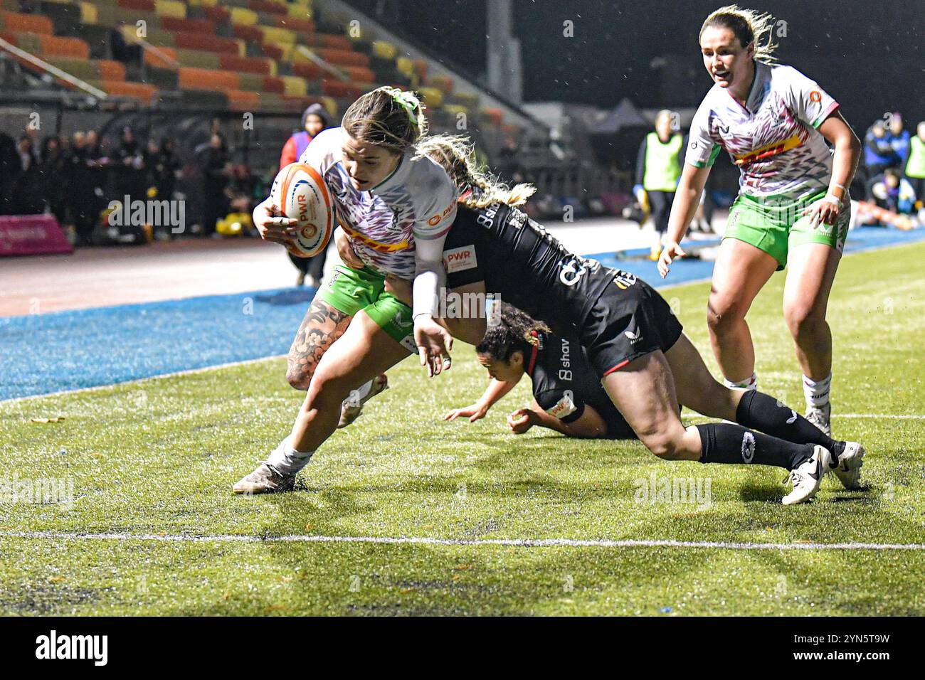 Beth Wilcock of Harlequins Women drives through to score in the second ...