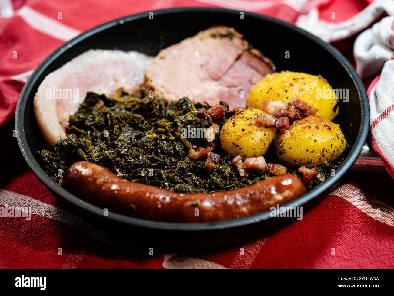 North German national dish green cabbage with roast pork, cabbage ...
