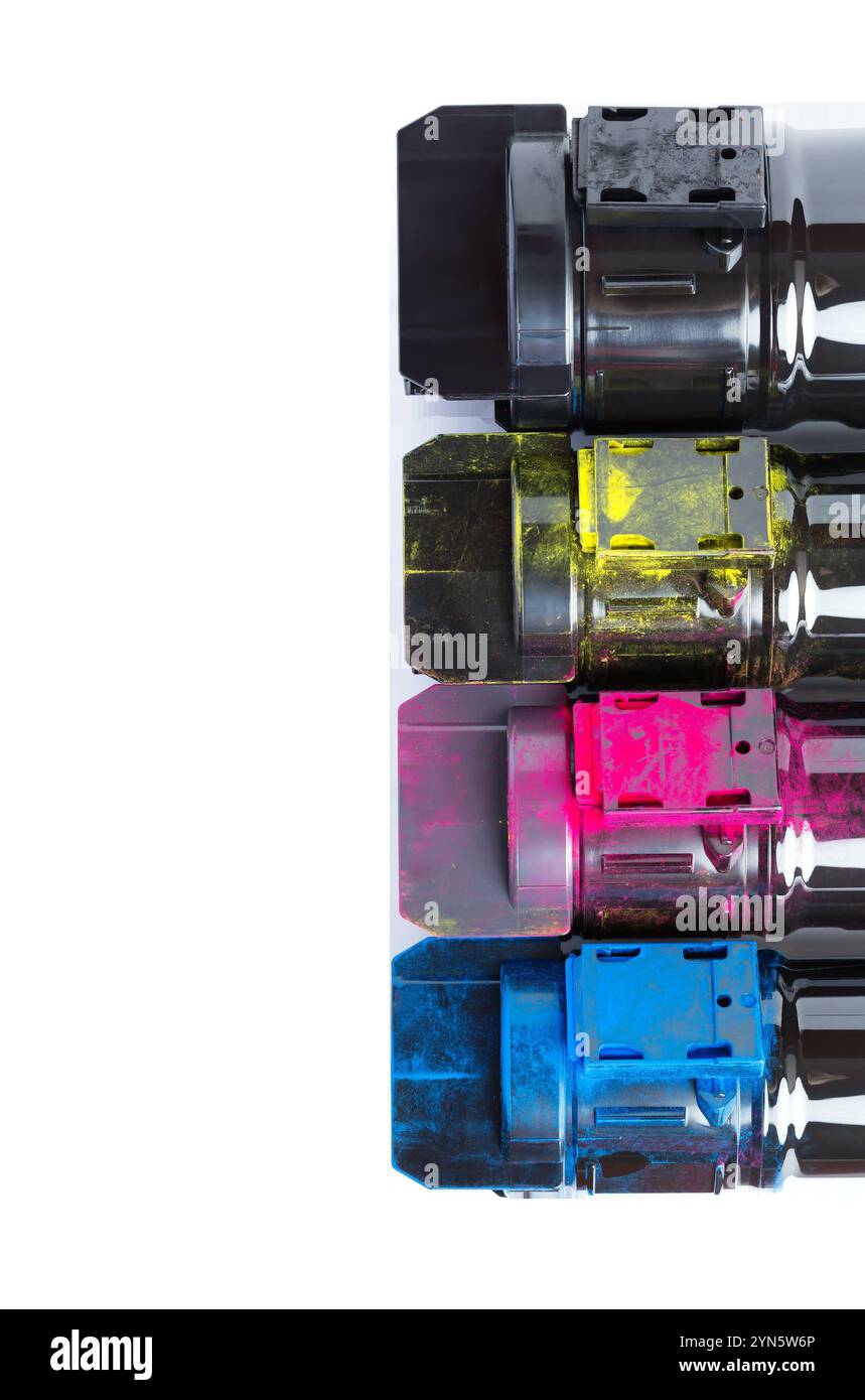 A set of cartridges for a color laser printer with scattered toner on ...