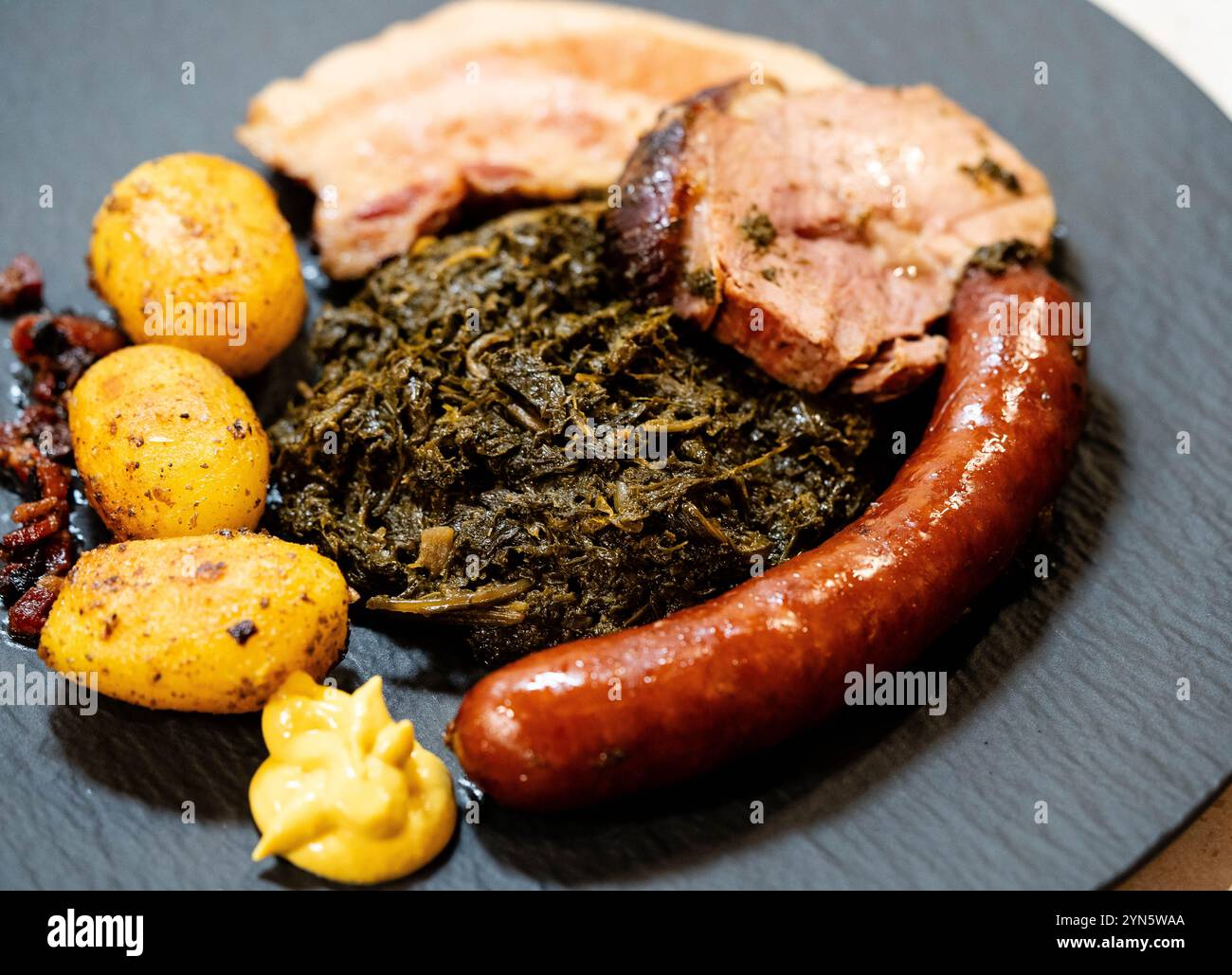 North German national dish green cabbage with roast pork, cabbage ...