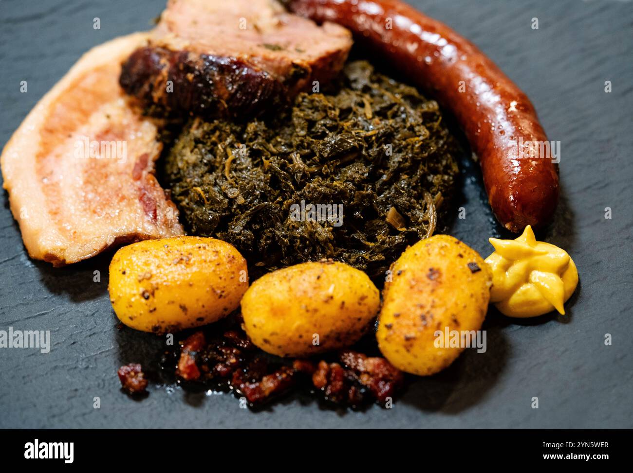 North German national dish green cabbage with roast pork, cabbage ...