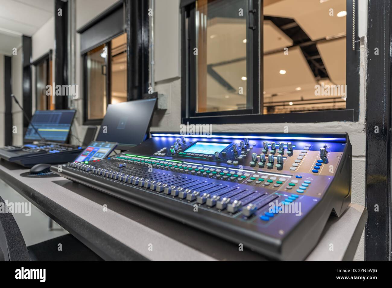 Mixing console, sound board, equipment in an auditorium, theater sound ...