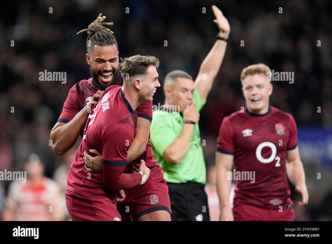 England's Tom Roebuck (second left) is congratulated by Chandler ...