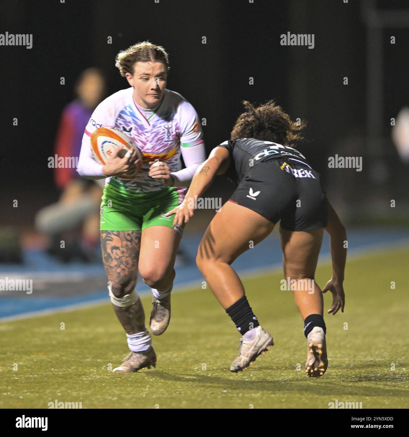 Beth Wilcock of Harlequins Women is tackled by Fancy Bermudez of ...