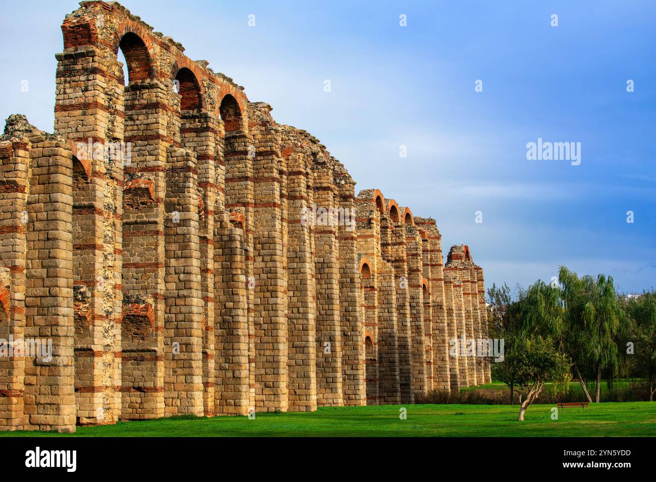 the solemn roman aqueduct of merida Stock Photo - Alamy