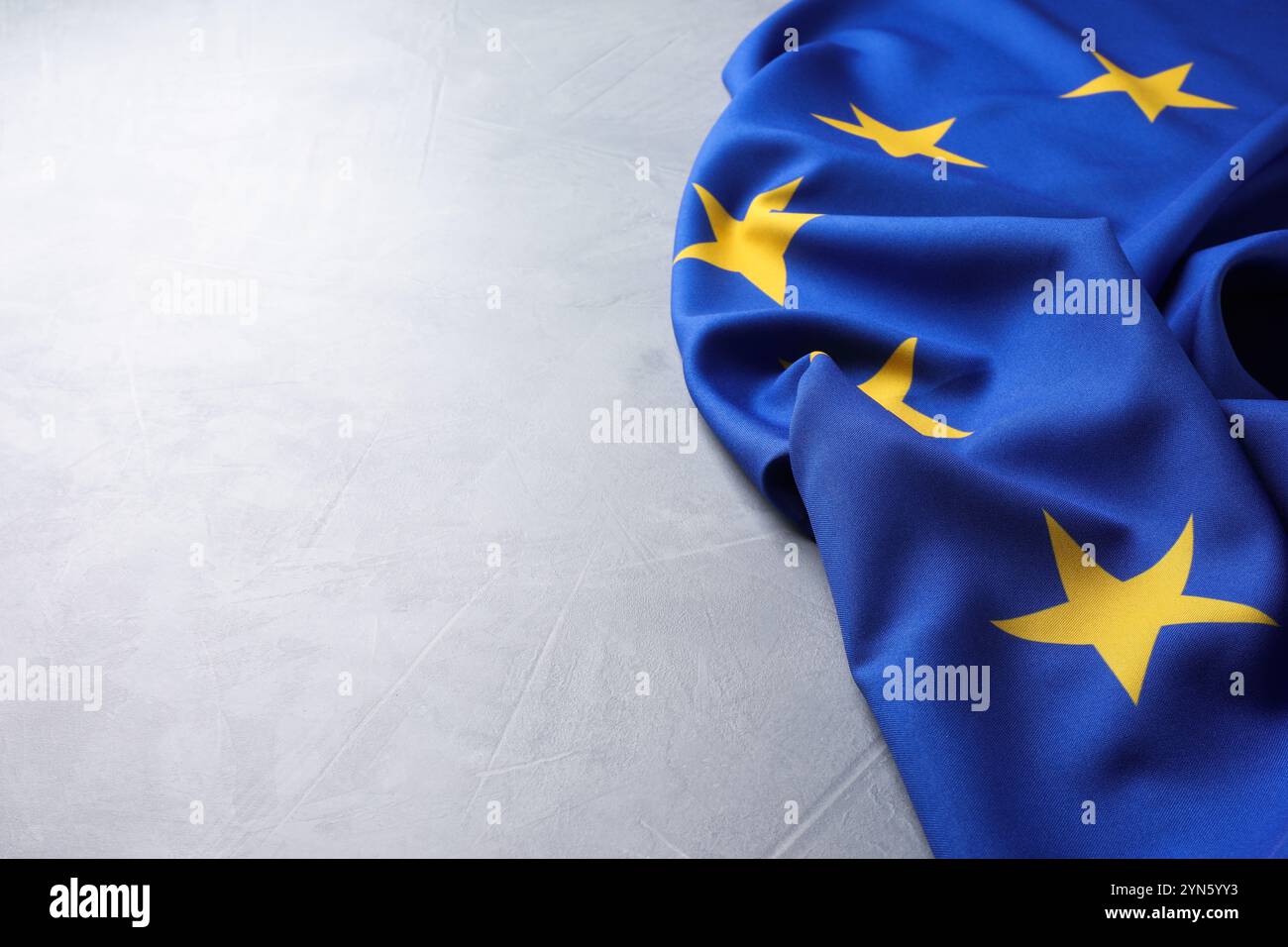 Flag of European Union on light grey table, space for text Stock Photo ...