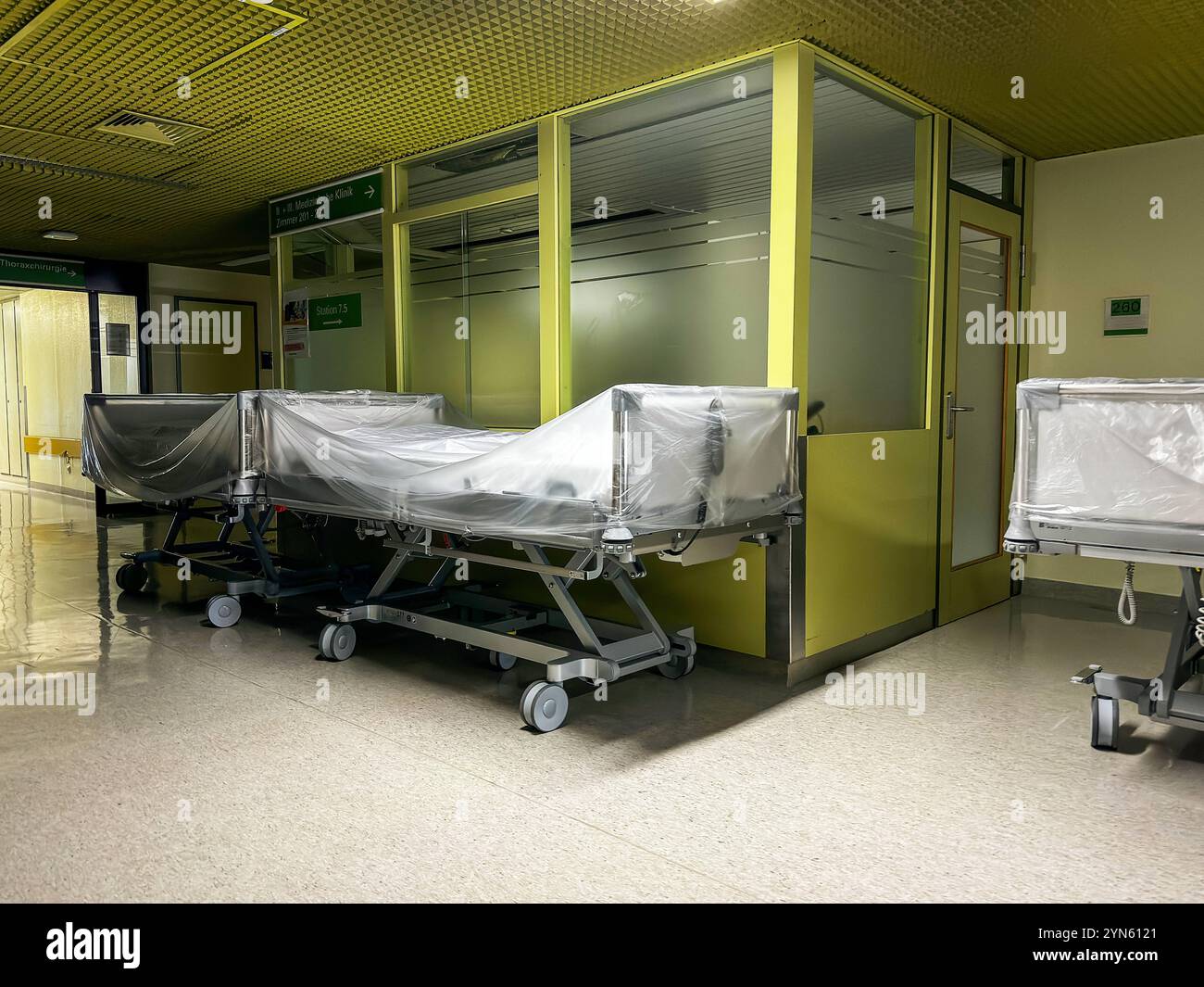 Germany - November 24, 2024: Empty hospital beds in a hospital corridor ...