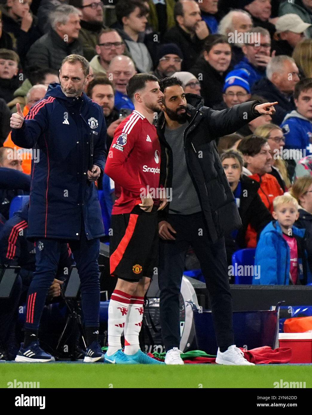 Manchester United manager Ruben Amorim gives instructions to Mason ...