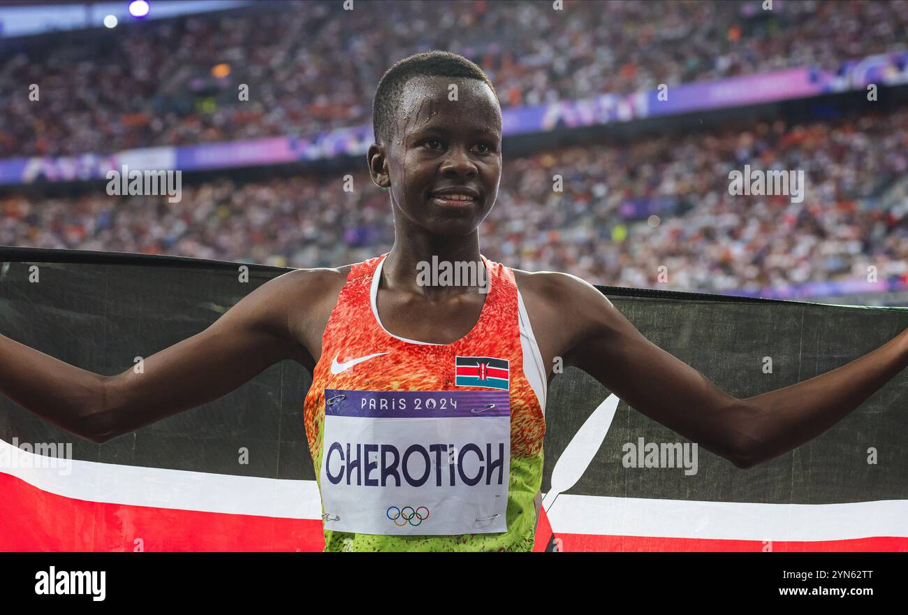 Faith Cherotich celebrating her medal with her country's flag at the Paris 2024 Olympic Games ...