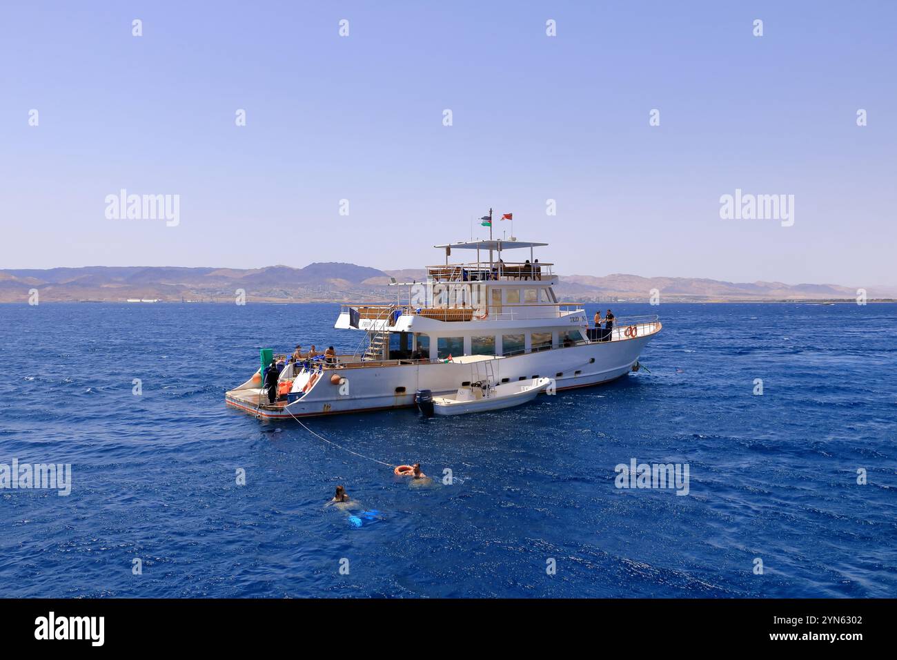 Aqaba in Jordan - May 17 2024: boats for snorkeling and diving in the ...