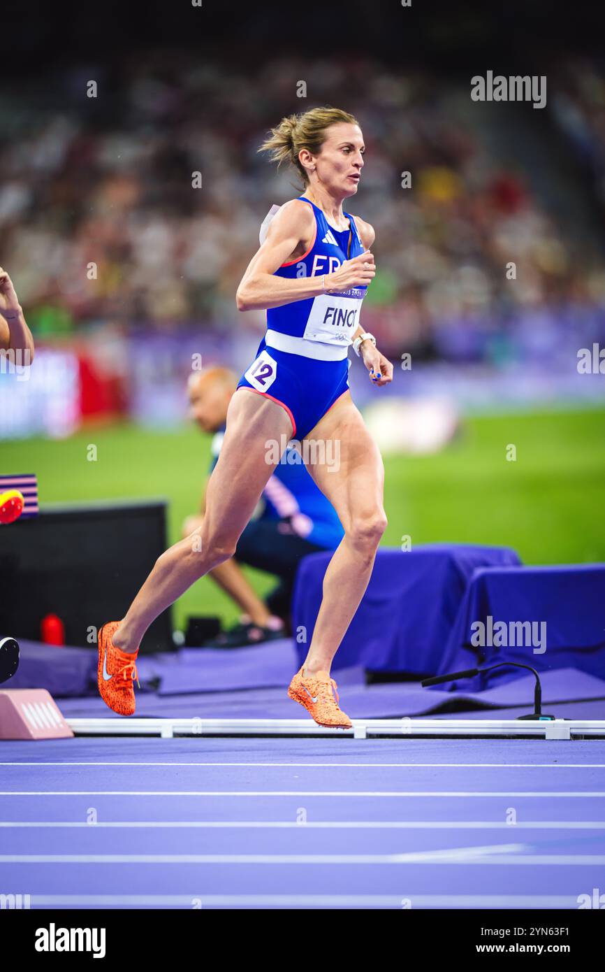 Alice Finot participating in the 3000 metres steeplechase at the Paris ...