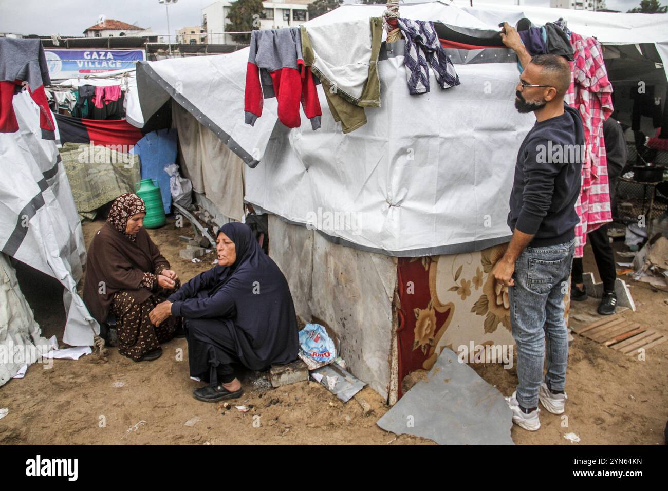 Middle East news.War In Gaza Displaced Palestinians gather following ...