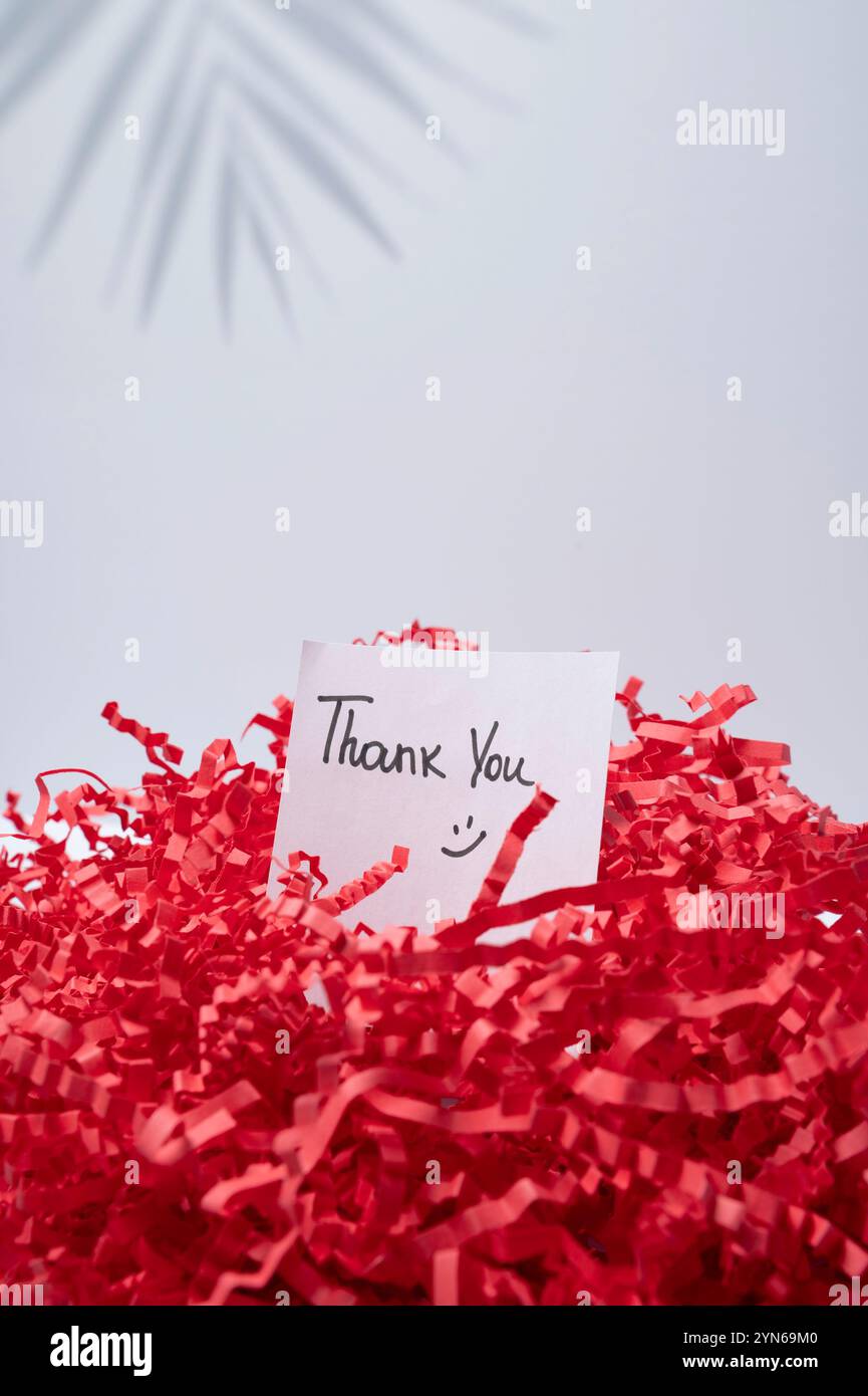 Words thank you written on sticky note Stock Photo - Alamy