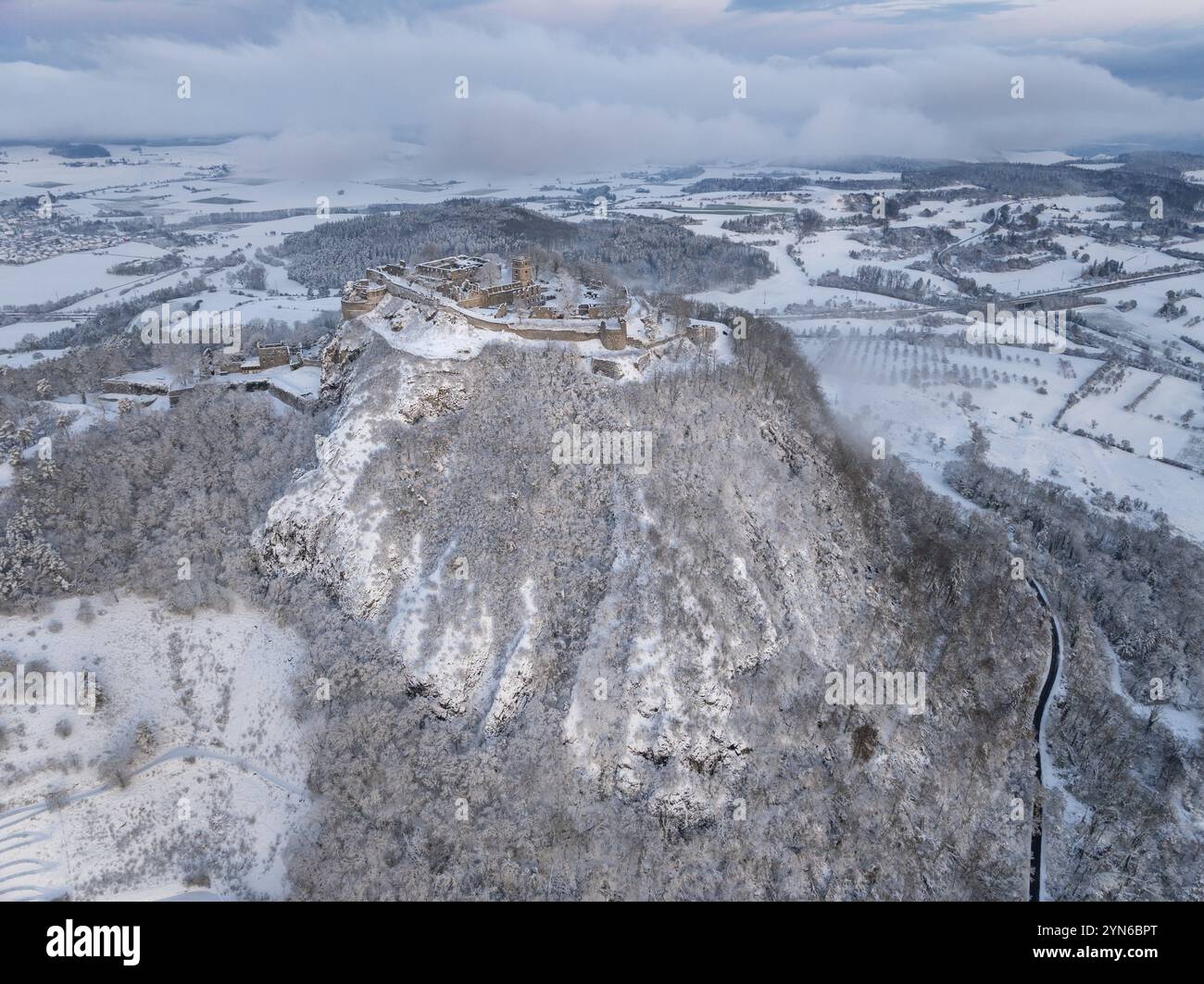 Aerial view of the snow-covered Hegau volcano Hohentwiel with Germany's ...