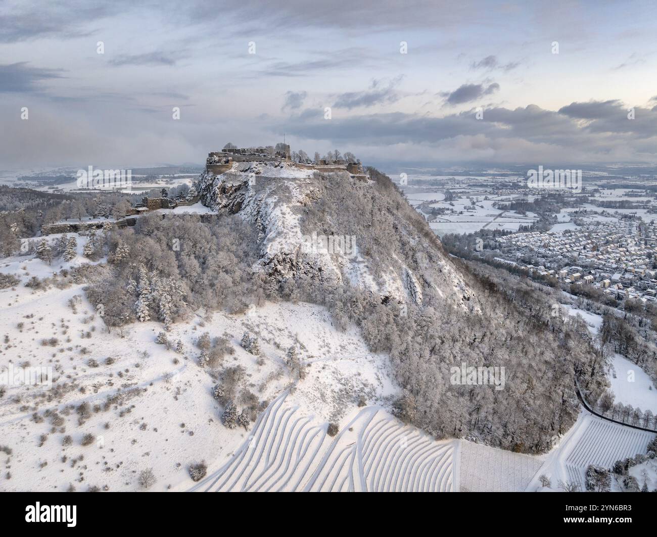 Aerial view of the snow-covered Hegau volcano Hohentwiel with Germany's ...
