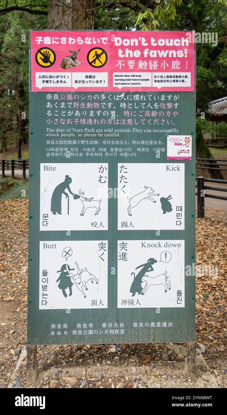 Nara, Japan - 05.06.2024: Warning sign in Nara park advising people not ...