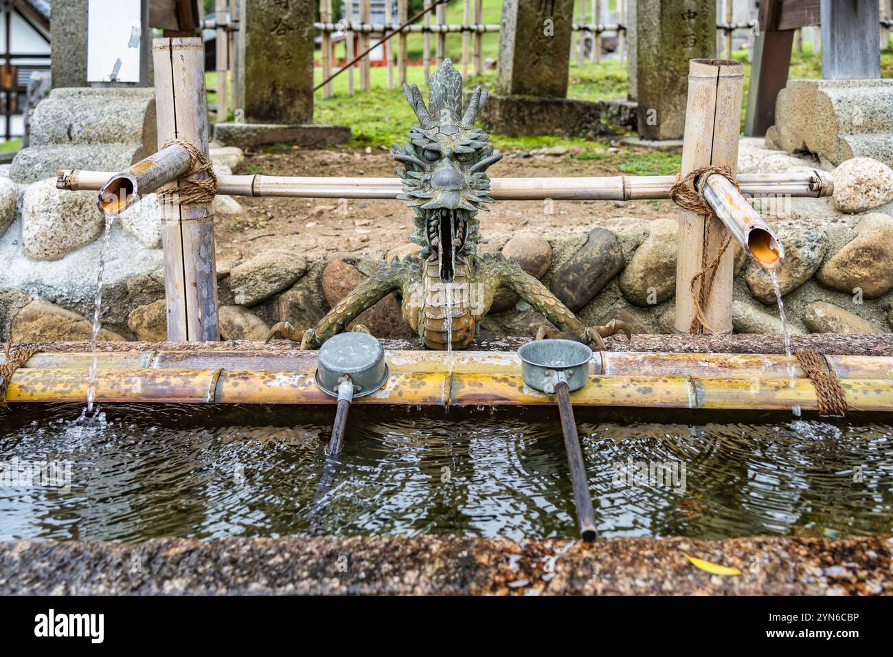 Water fountain for purification called temizuya at a Shinto Buddhist ...