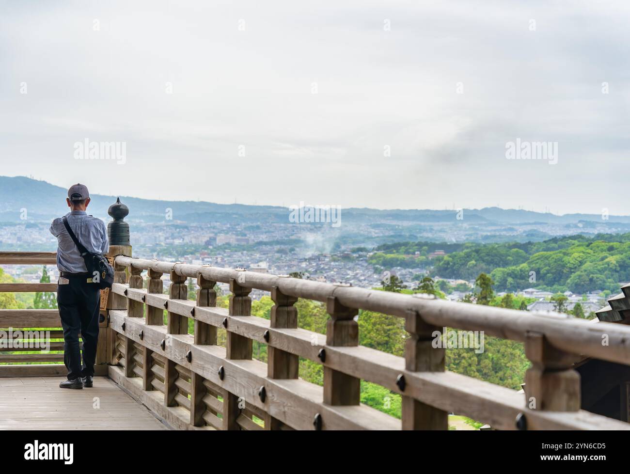 Back view of a tourist on the balcony of Todai-ji Nigatsu-do temple ...