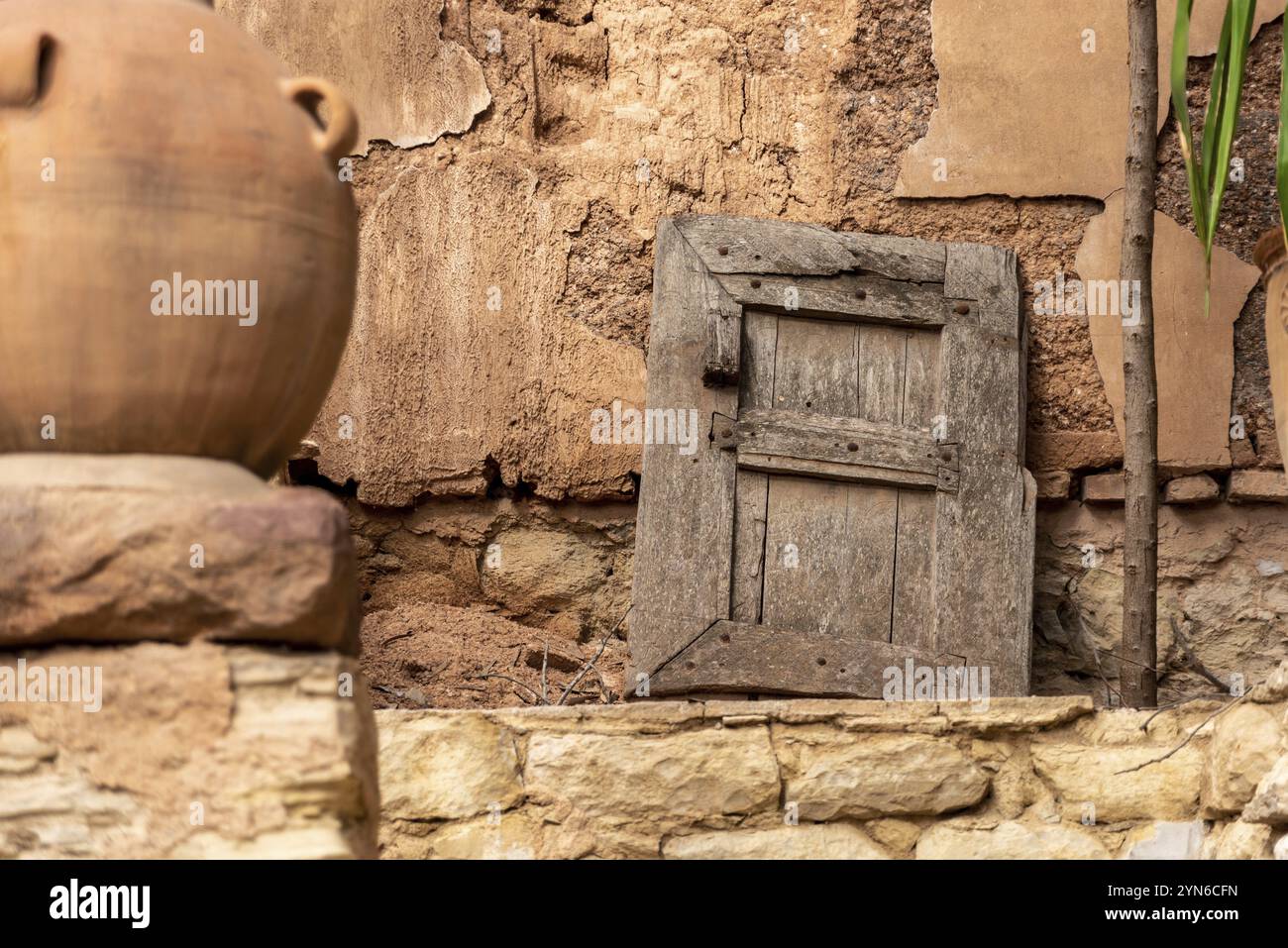 Beautiful old window shutter leaning at a facadeof a house in Agadir ...