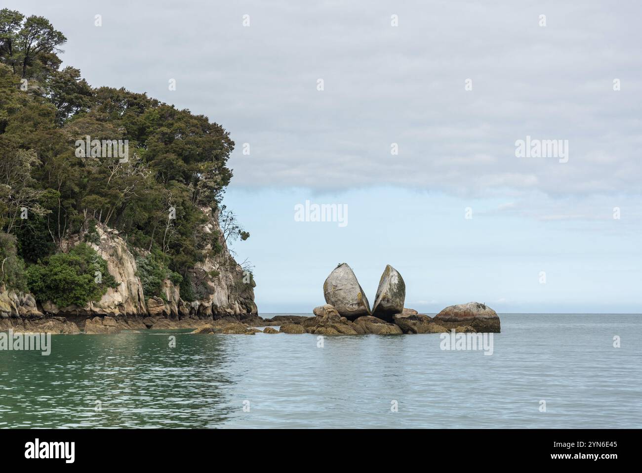 Famous split rock at the coast near to Abel Tasman National Park, New ...