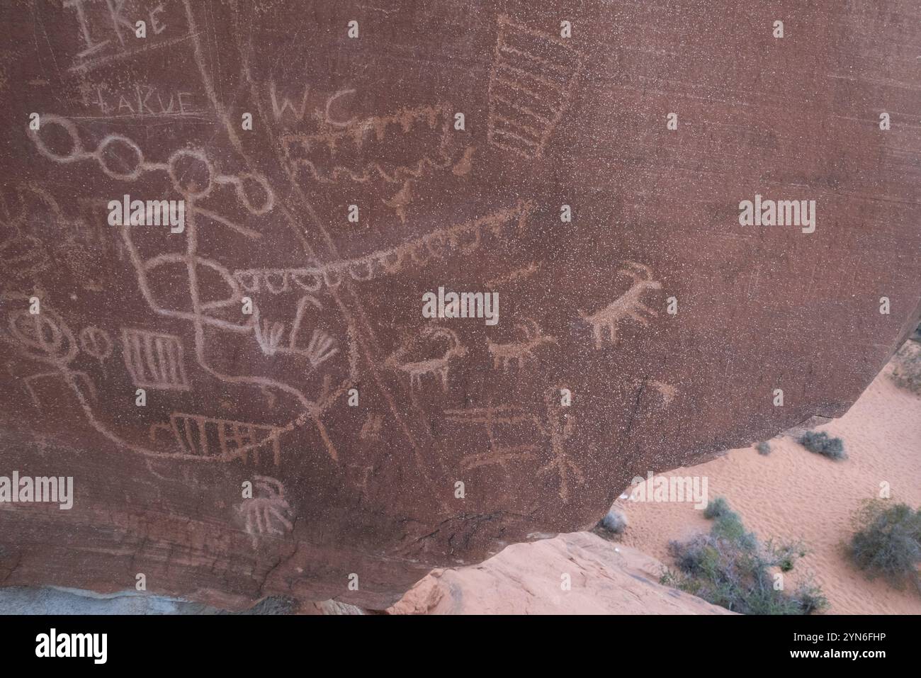 Historic petroglyphs from native Americans on Atlatl Rock in the Valley ...