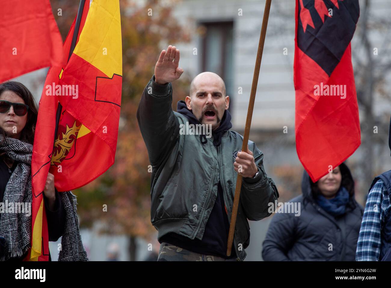A far-right protester performs the fascist salute during a rally in ...