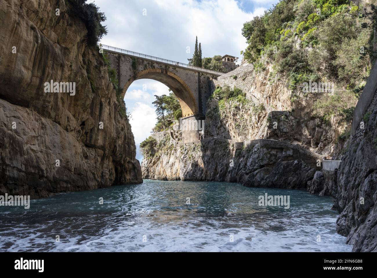 Scenic arch bridge at the Fjord of Fury, Amalfi Coast of Southern Italy ...