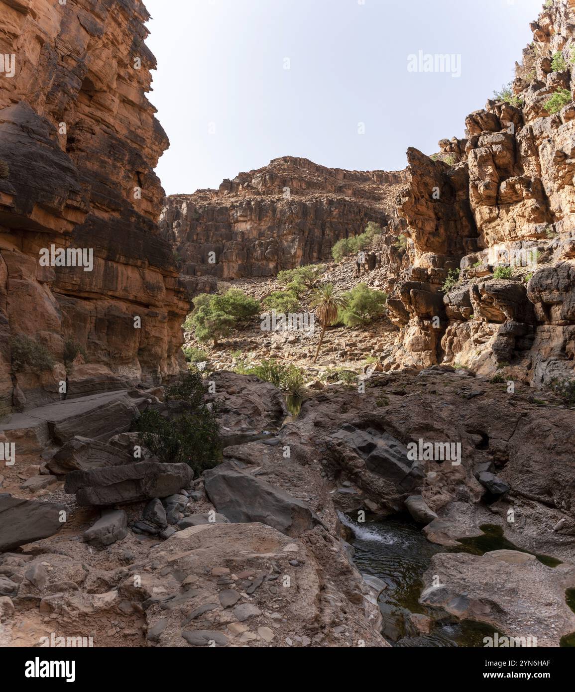 Hiking through the iconic Amtoudi canyon in the Anti-Atlas, Morocco ...