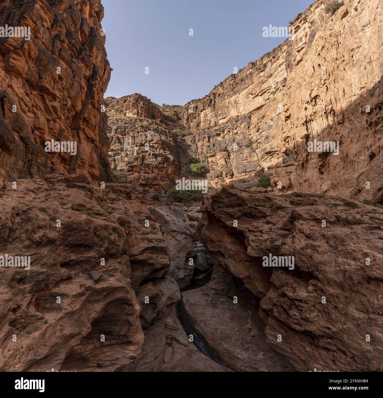 Hiking through the iconic Amtoudi canyon in the Anti-Atlas, Morocco ...