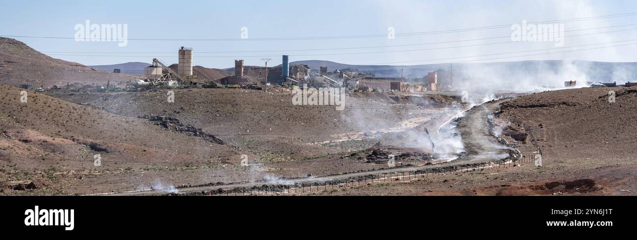 Trash being burned beside the road near the Draa valley in Morocco ...