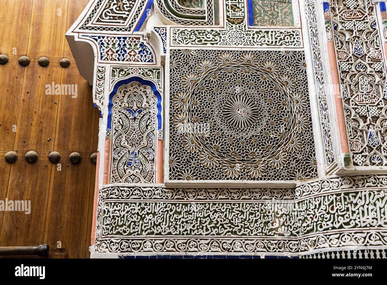 Beautiful ornate relief at a facade of a madrasa in Fes, a Koran school ...