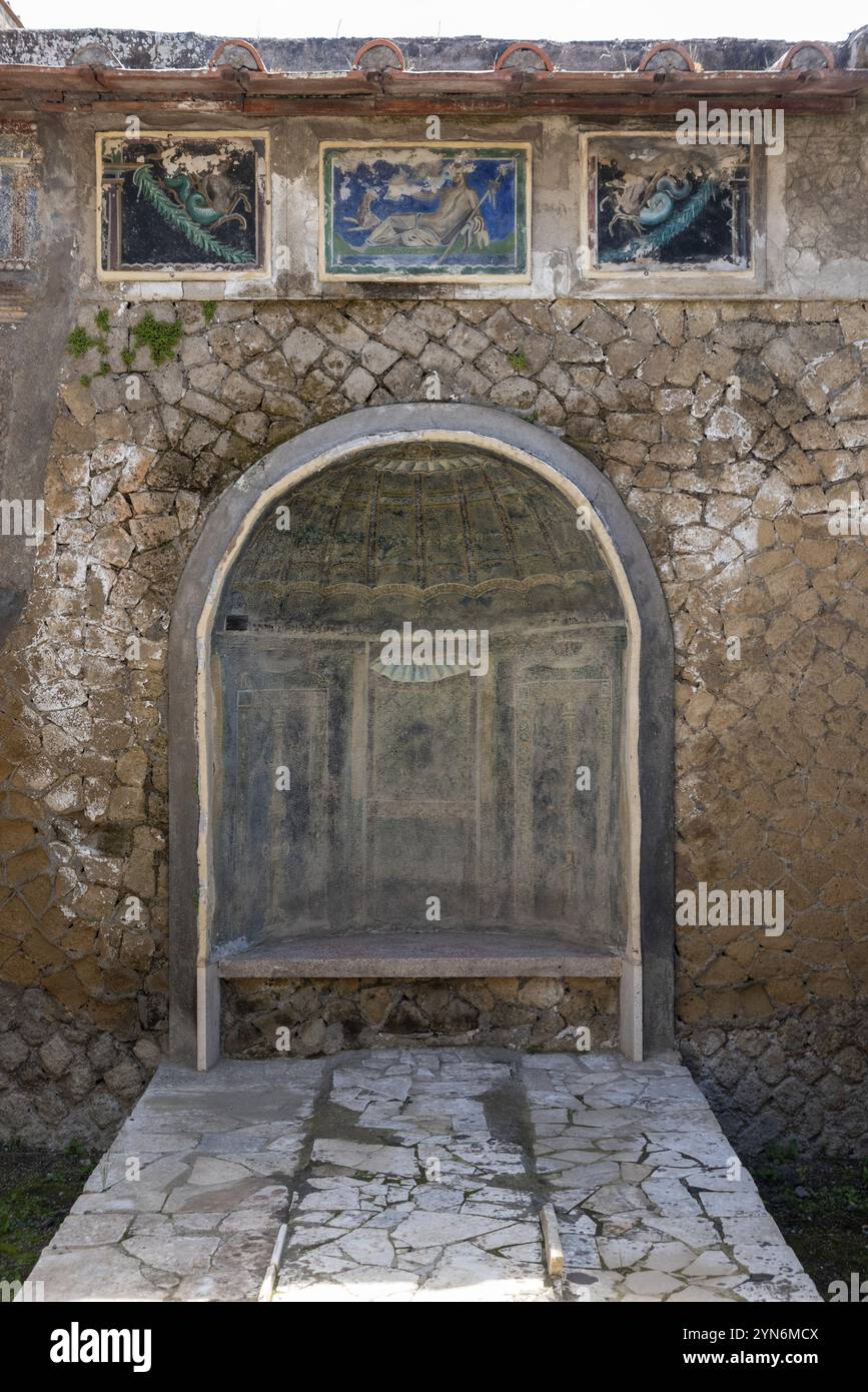 HERCULANEUM, ITALY, MAY 05, 2022, Ancient colorful shrine or altar of a ...
