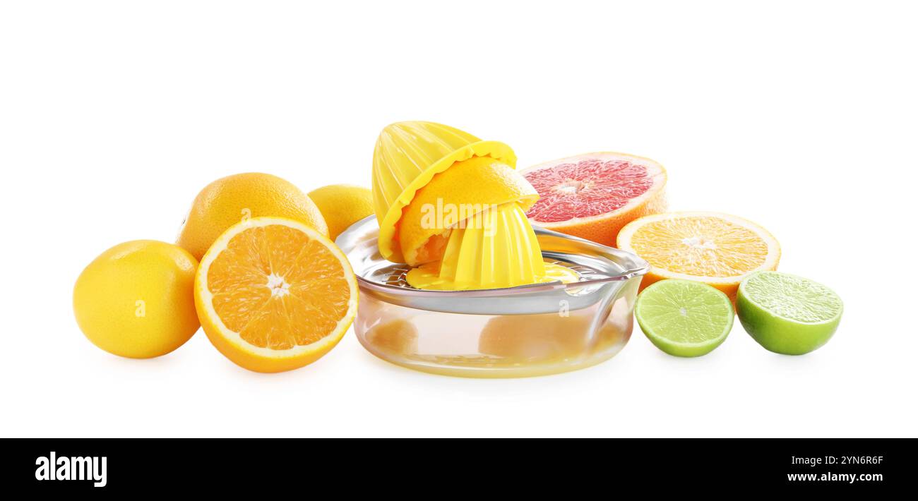 Metal juicer and different citrus fruits isolated on white Stock Photo ...
