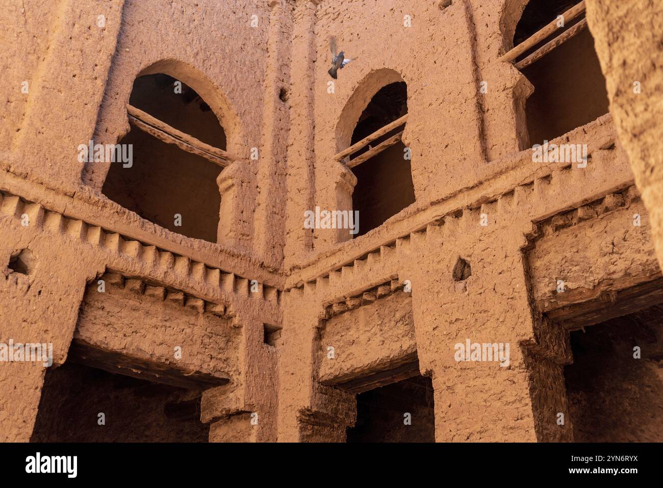 Windows in an inner courtyard of a typcial berber house in a derelict ...