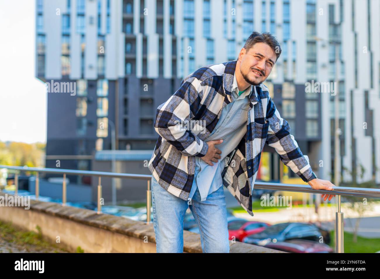 Caucasian mature man traveler feeling sudden strong abdominal stomach ...