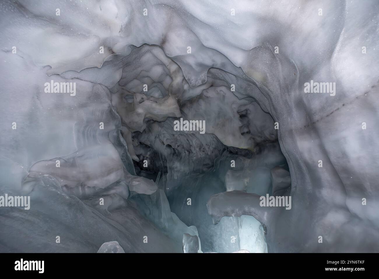 Great ice formation in a natural small glacial cave Stock Photo - Alamy