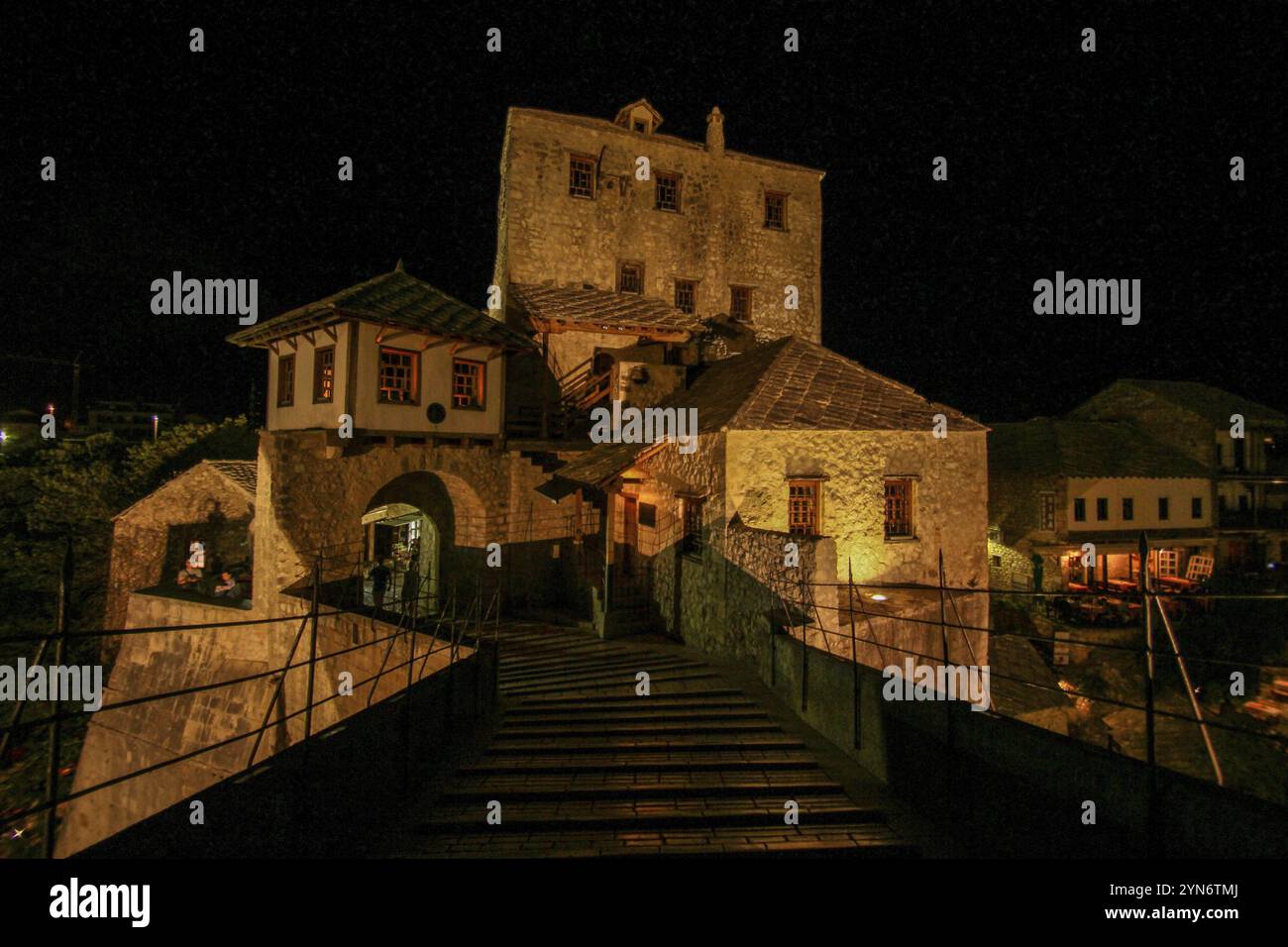 Famous rebuilt historic bridge in downtown Mostar at night, Bosnia and ...